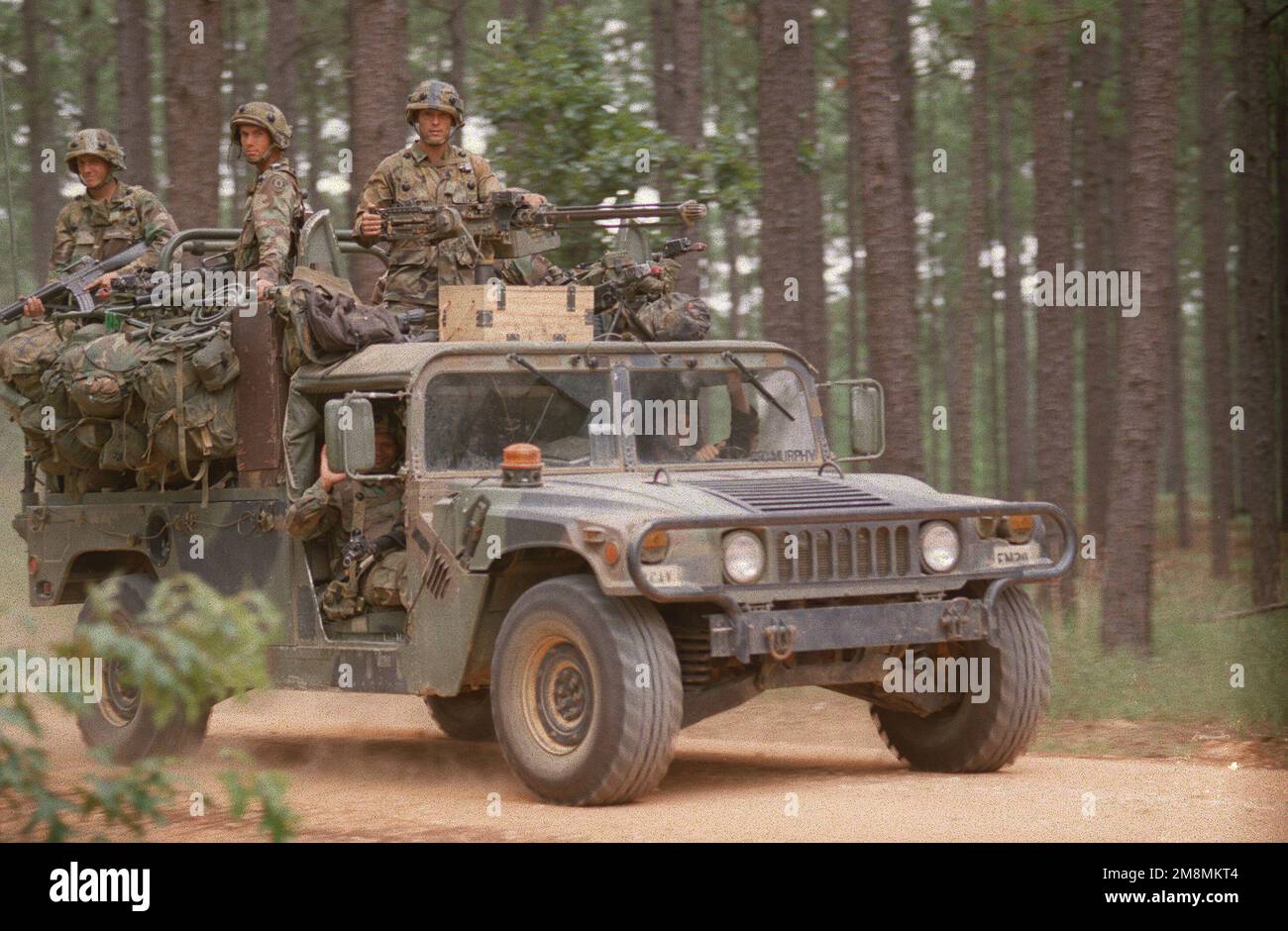 Troopers from the 2nd Armored Cavalry Regiment, equipped with M-16 ...