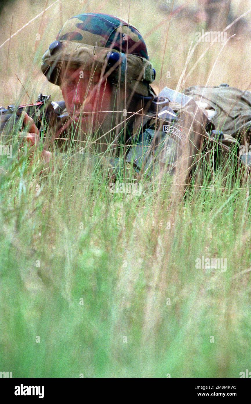 A Belgium soldier in the prone position on guard at the Joint Readiness ...