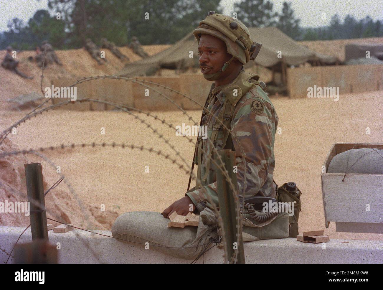 A trooper from the 2nd Armored Cavalry Regiment posts guard at the ...