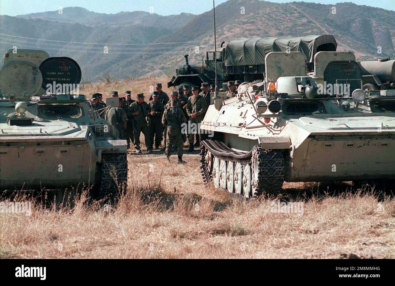 970623-M-0824M-005. [Complete] Scene Caption: Sergeant Marcos Enriquez ...