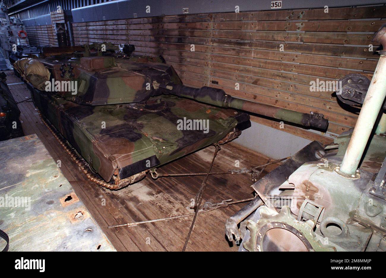 An M1A1 Abrams Tank sits in the well deck of the USS COMSTOCK (LSD 47) ready for its mission to ...
