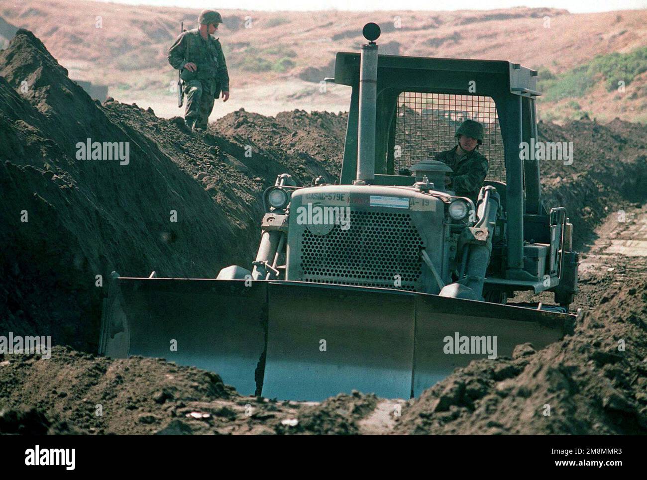 Engineers with Army National Guard, 578th Engineer Battalion use a D-7 ...