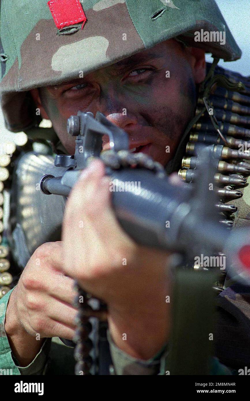 Marines from Landing Support Battalion (identified by red patch) move ...