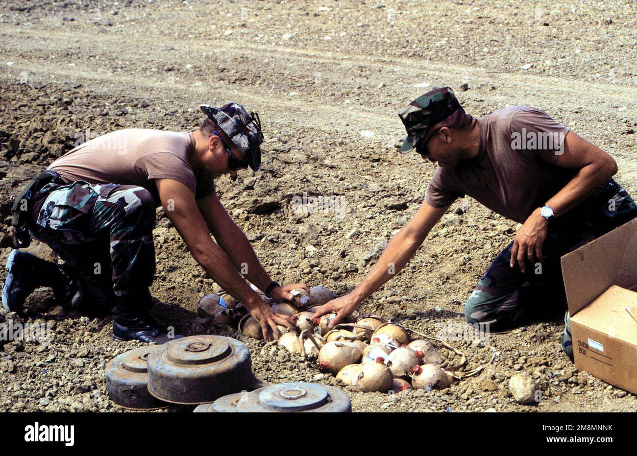 US Navy Explosive Ordnance Disposal Mobile Unit 2 (EODMU-2) members ...