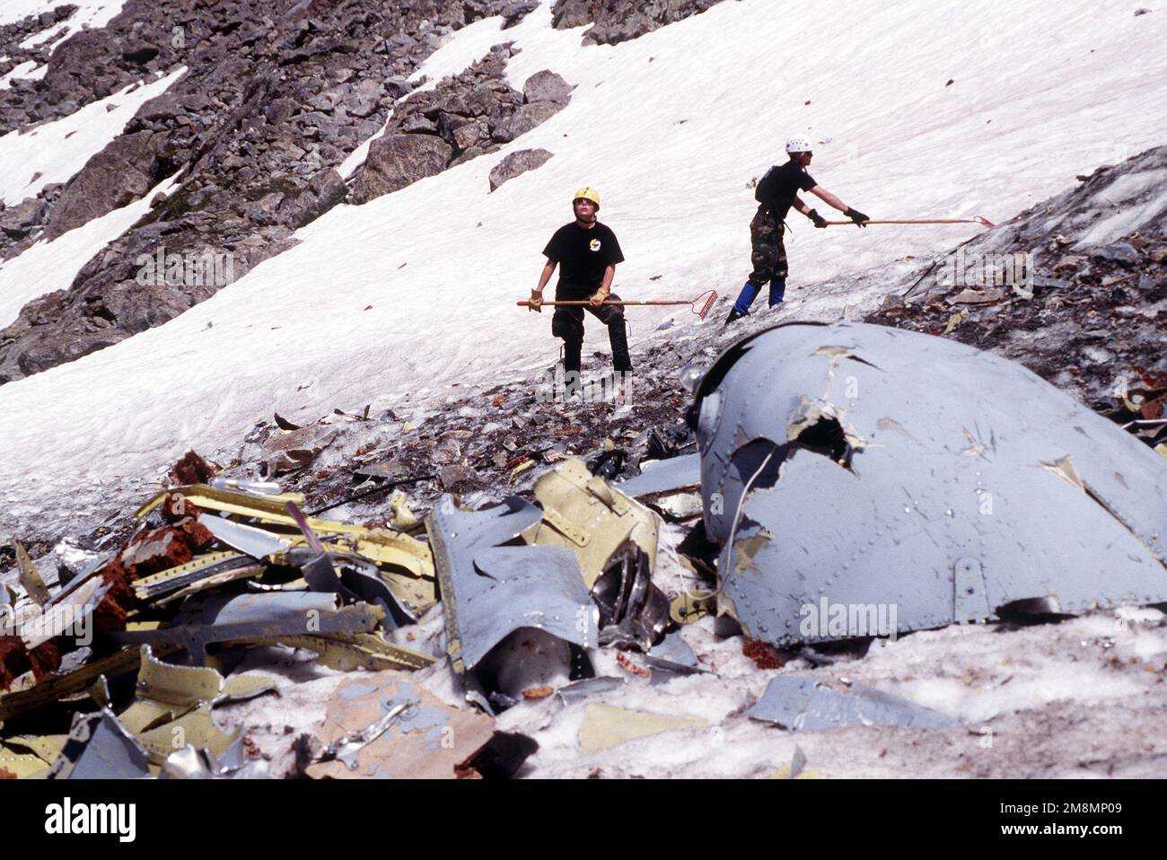 A1C Myca Romes (left) and SPT Luke Closson (right) collect A-10 debris ...