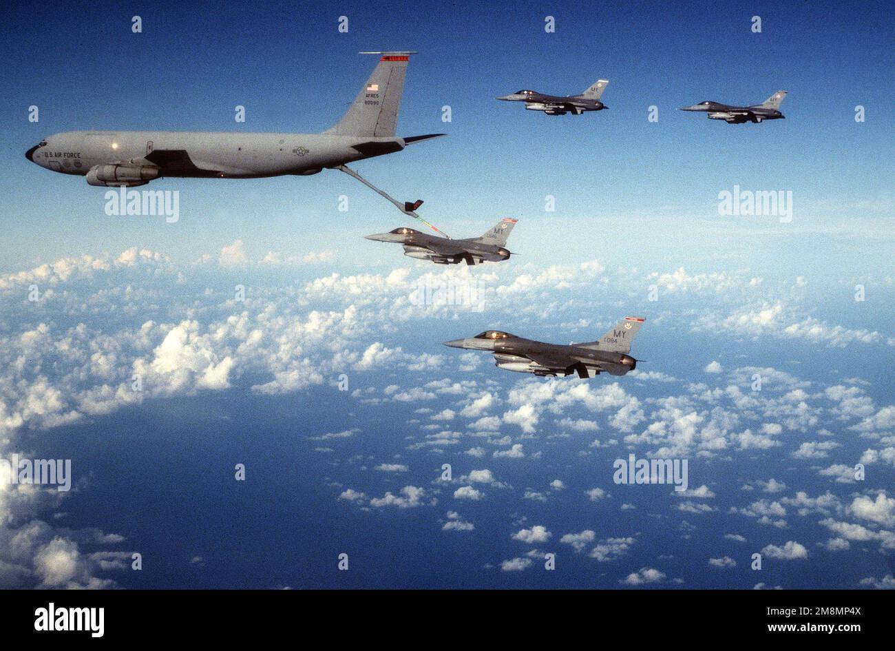 Four F-16 Falcon aircraft from the 347th Composite Wing, 69th Fighter ...