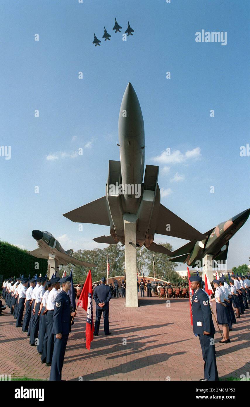 U.S. Air Force airmen display state flags along the walkway of the ...