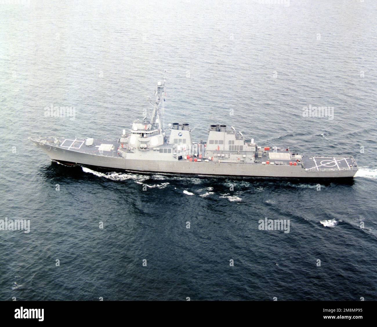 High oblique port side view of the guided missile destroyer USS MAHAN ...