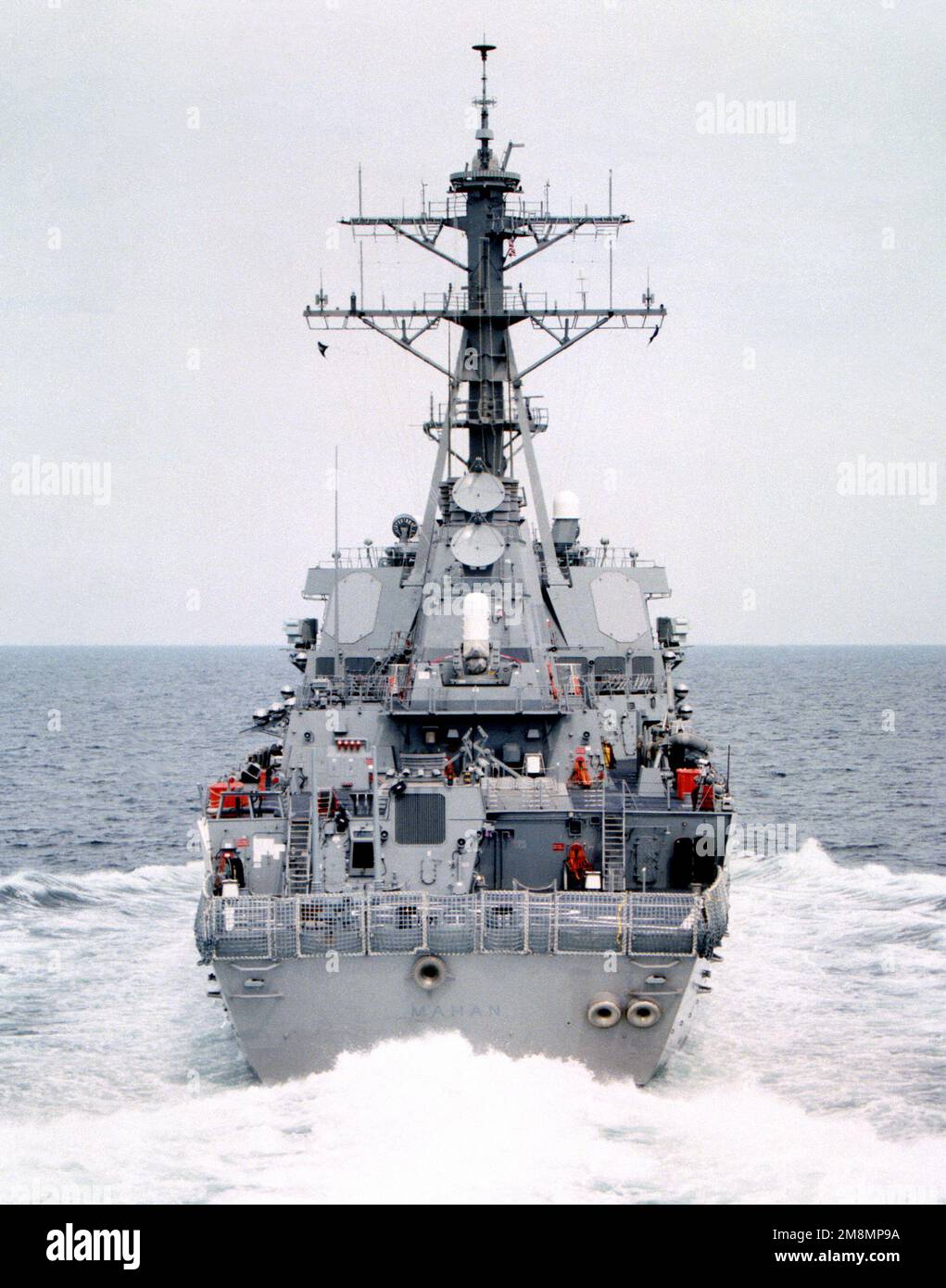 Aerial stern-on view of the guided missile destroyer USS MAHAN (DDG-72 ...