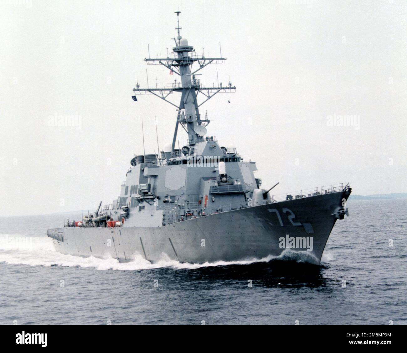 Aerial starboard bow-on view of the guided missile destroyer USS MAHAN ...