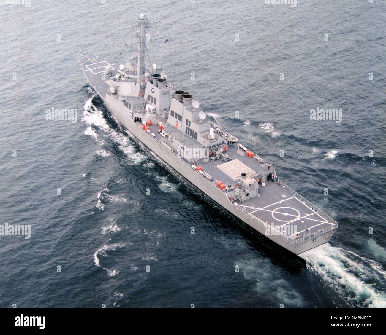 High oblique port quarter view of the guided missile destroyer USS ...