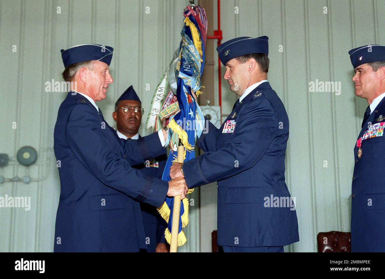 BGEN (selectee) Randall K. Bigum (right) receives the units ...