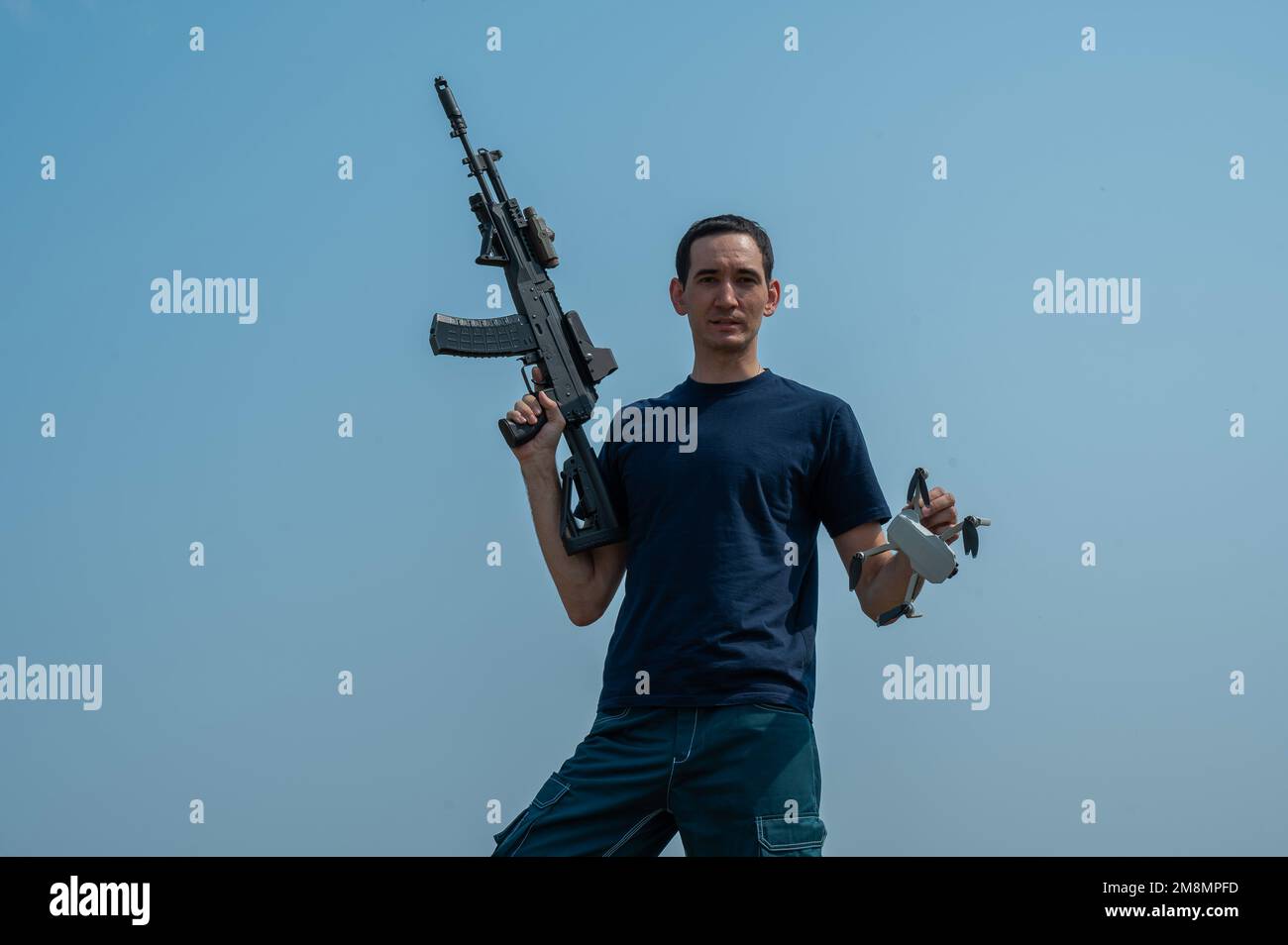Caucasian man shot down a drone with a shot from a rifle Stock Photo ...