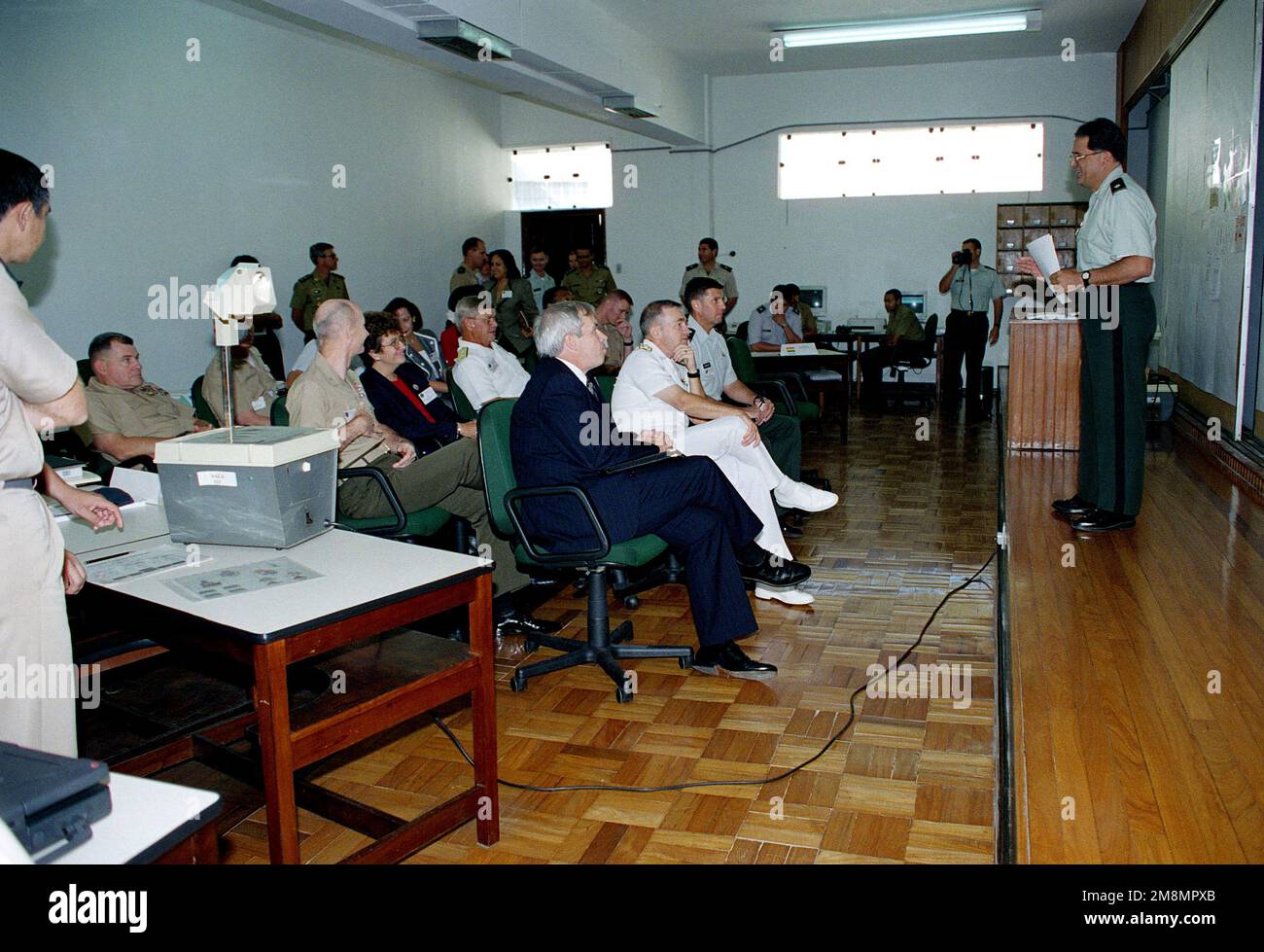 (Left to right) The Honorable Melvyn Levitsky, US Ambassador to Brazil, US Navy Rear Admiral ...