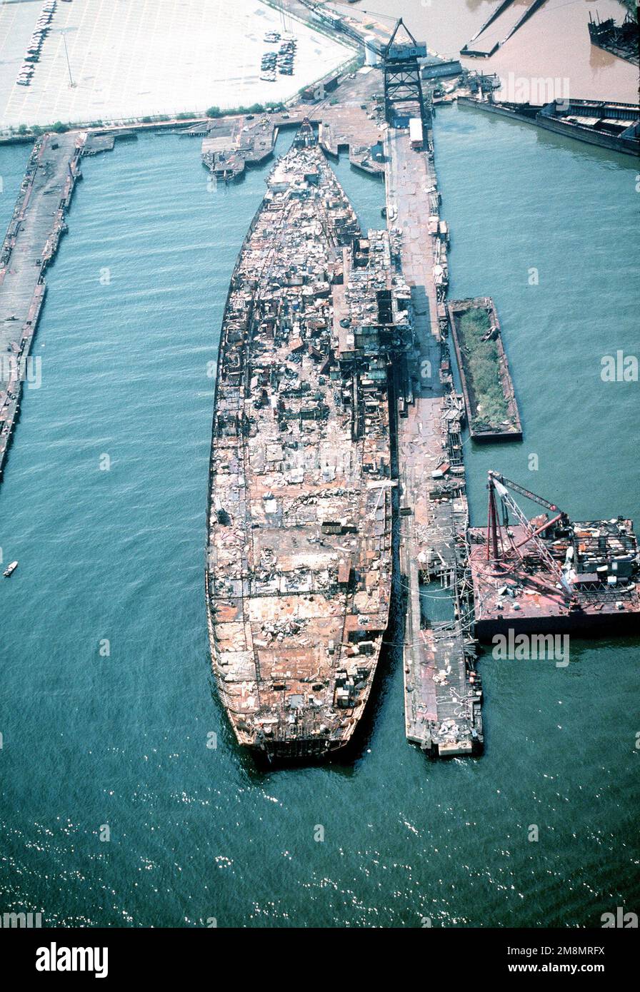 Aerial stern-on view of the aircraft carrier CORAL SEA (CV 43) tied up ...