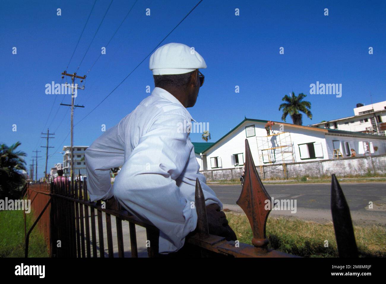 A local Georgetown resident watches as members of the 820th Red Horse ...
