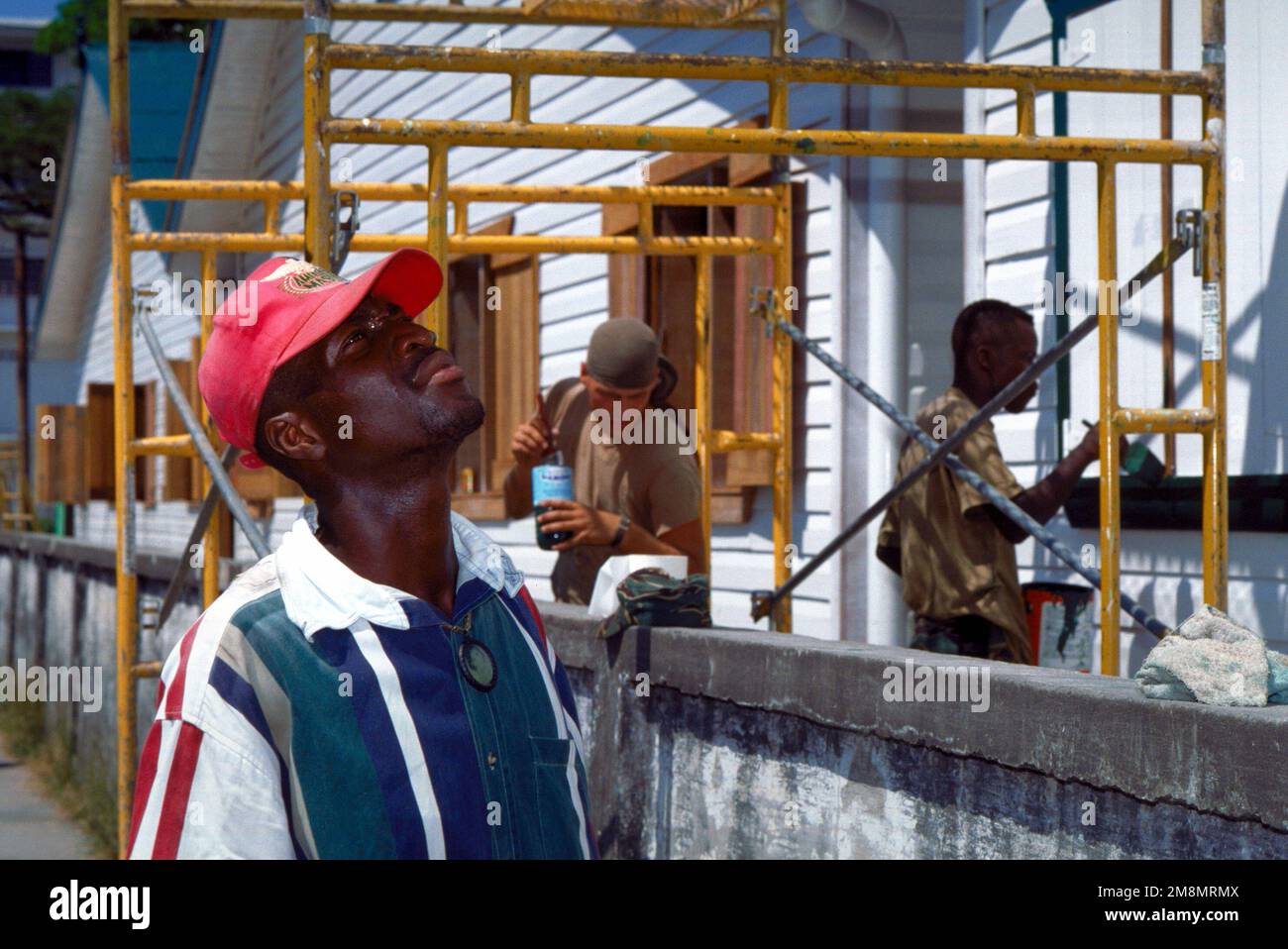 A local Georgetown resident watches as members of the 820th Red Horse ...