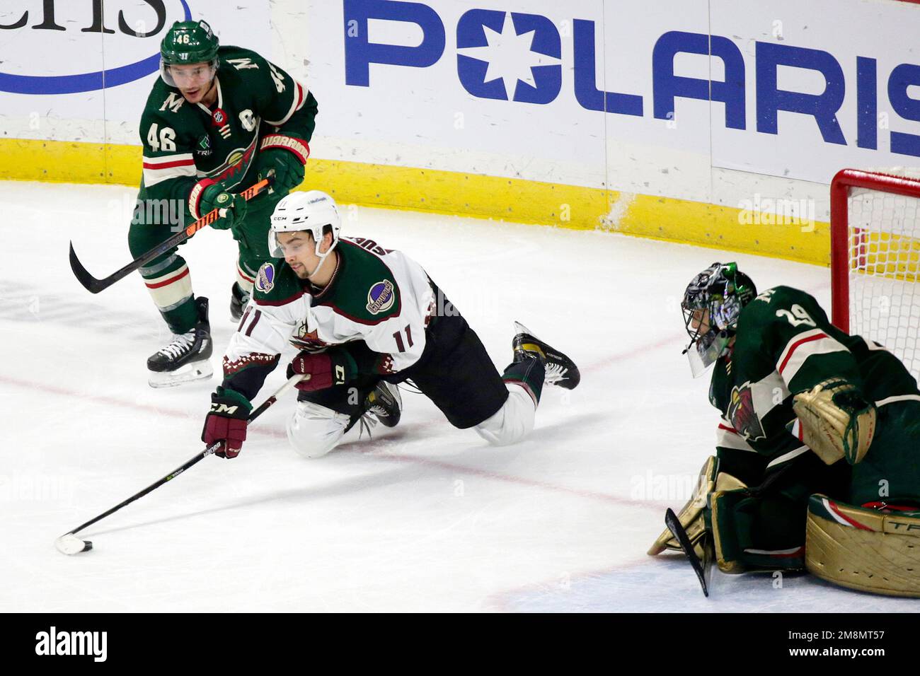 Arizona Coyotes right wing Dylan Guenther (11) shoots on Minnesota Wild ...