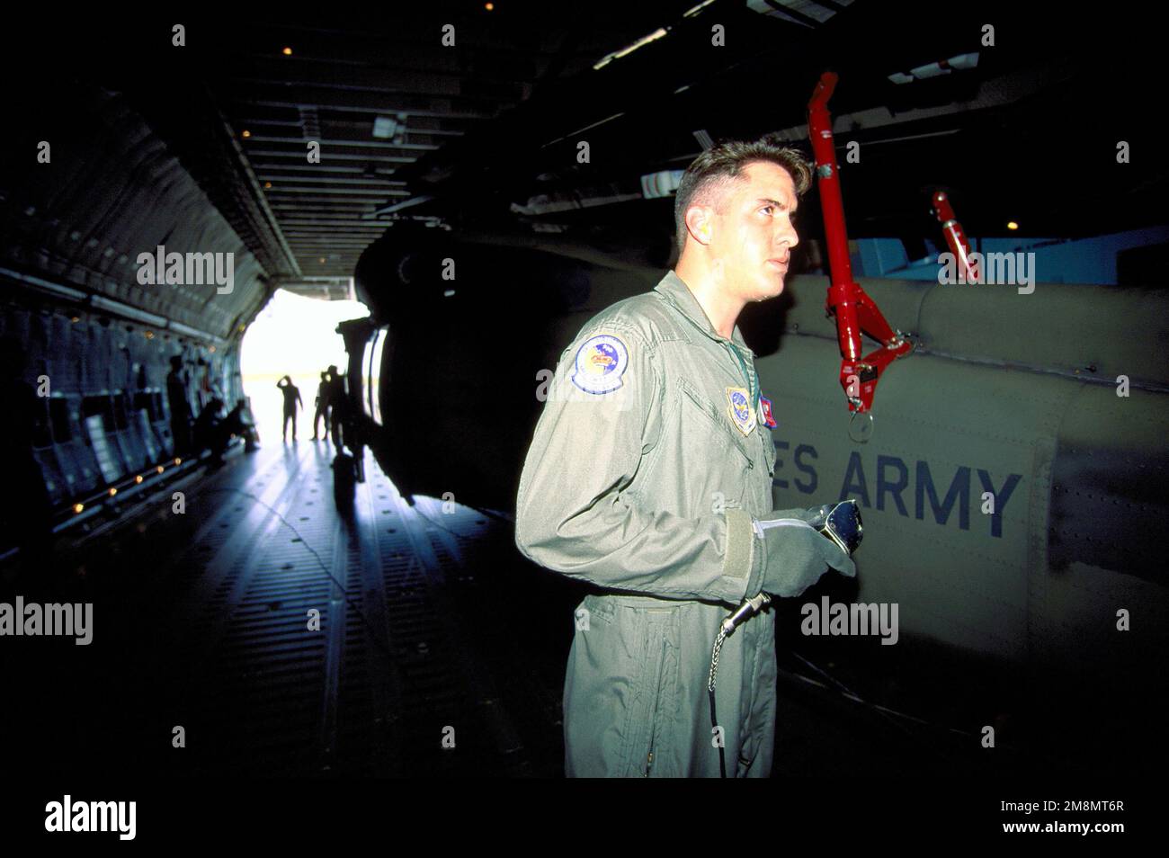 SGT. Fred Caddel a C-5 flight engineer assigned to the 3rd Airlift ...