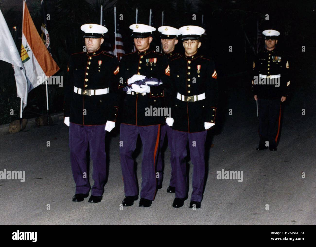Marine Color Guard detail carrying the Colors at the evening Colors ...