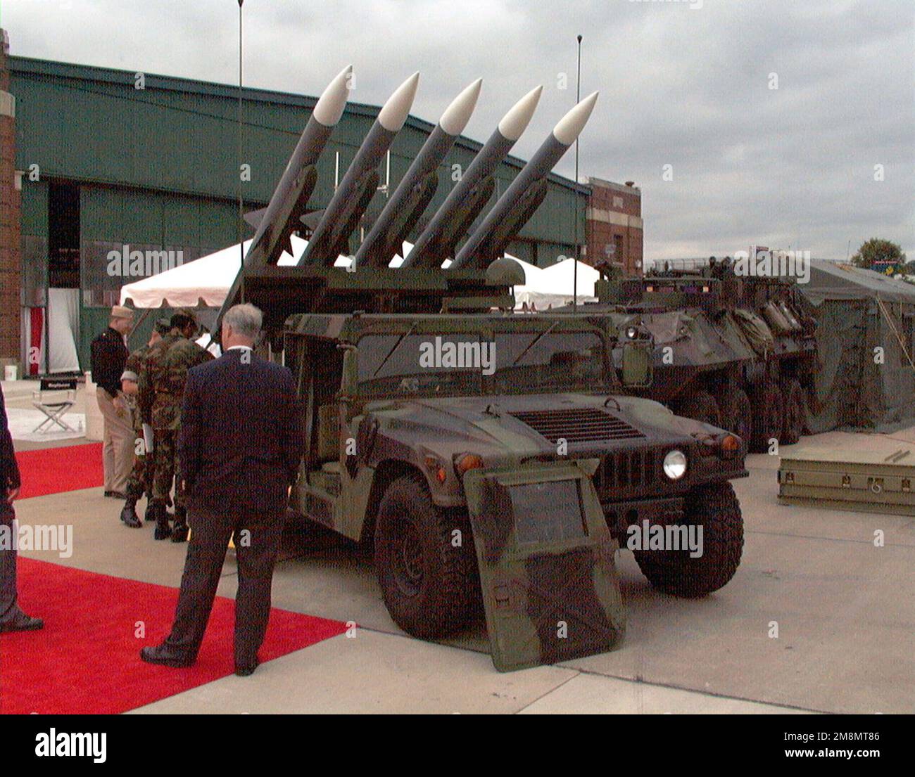 A High-Mobility Multipurpose Wheeled Vehicle (HMMWV) loaded with an ...