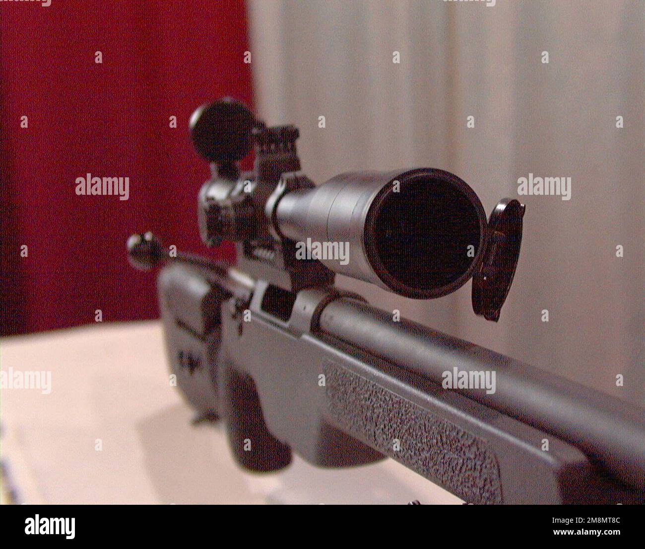 A Leupold Mark 4, 10x powered scope is displayed atop a rifle during ...