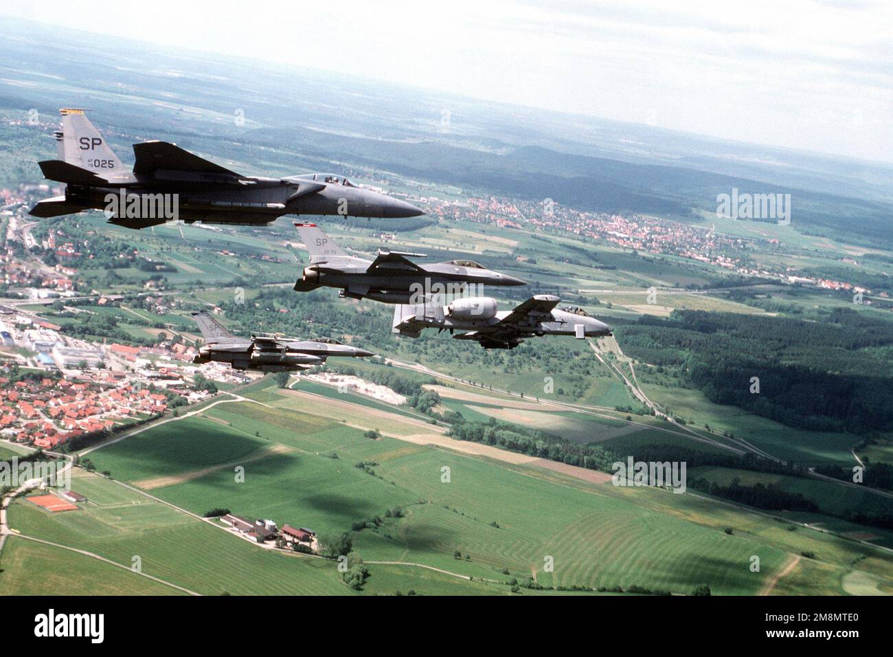 An A-10 II Thunderbolt leads a formation of two F-16 Fighting Falcons ...
