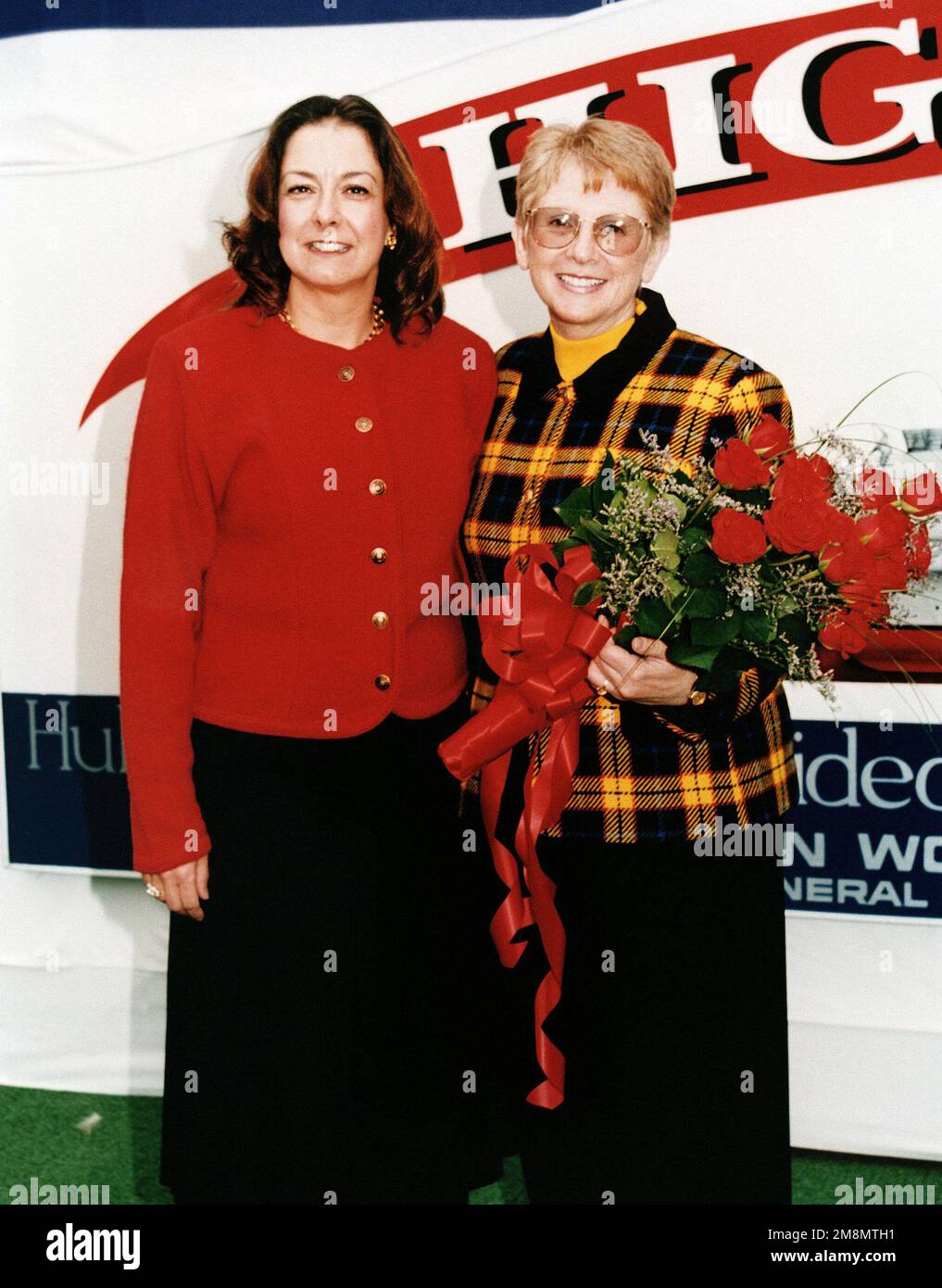 Lieutenant Colonel Robin Higgins, USMC, (Ret.) ships sponsor (right ...