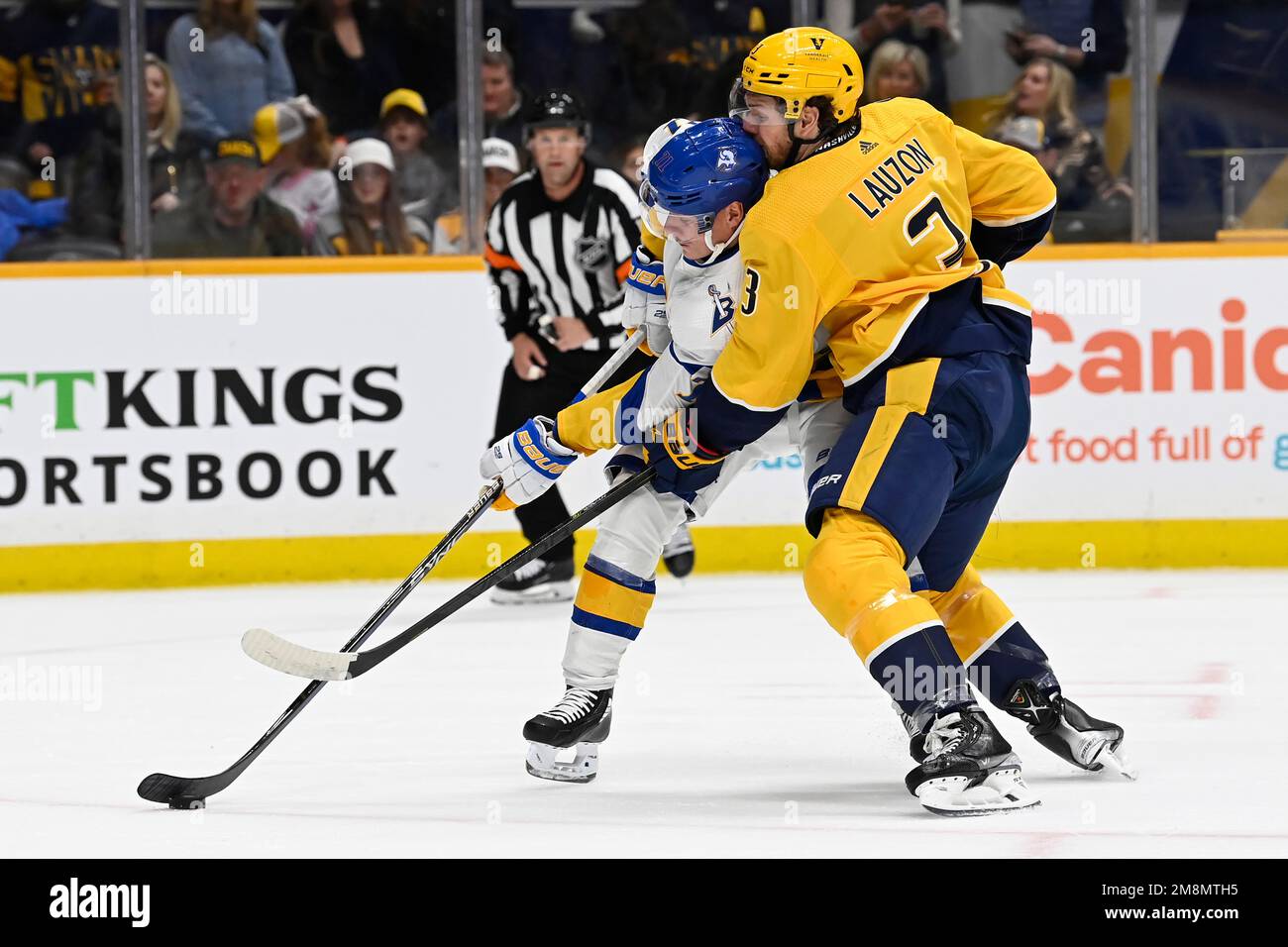 Buffalo Sabres left wing Victor Olofsson, left, moves the puck ahead of ...