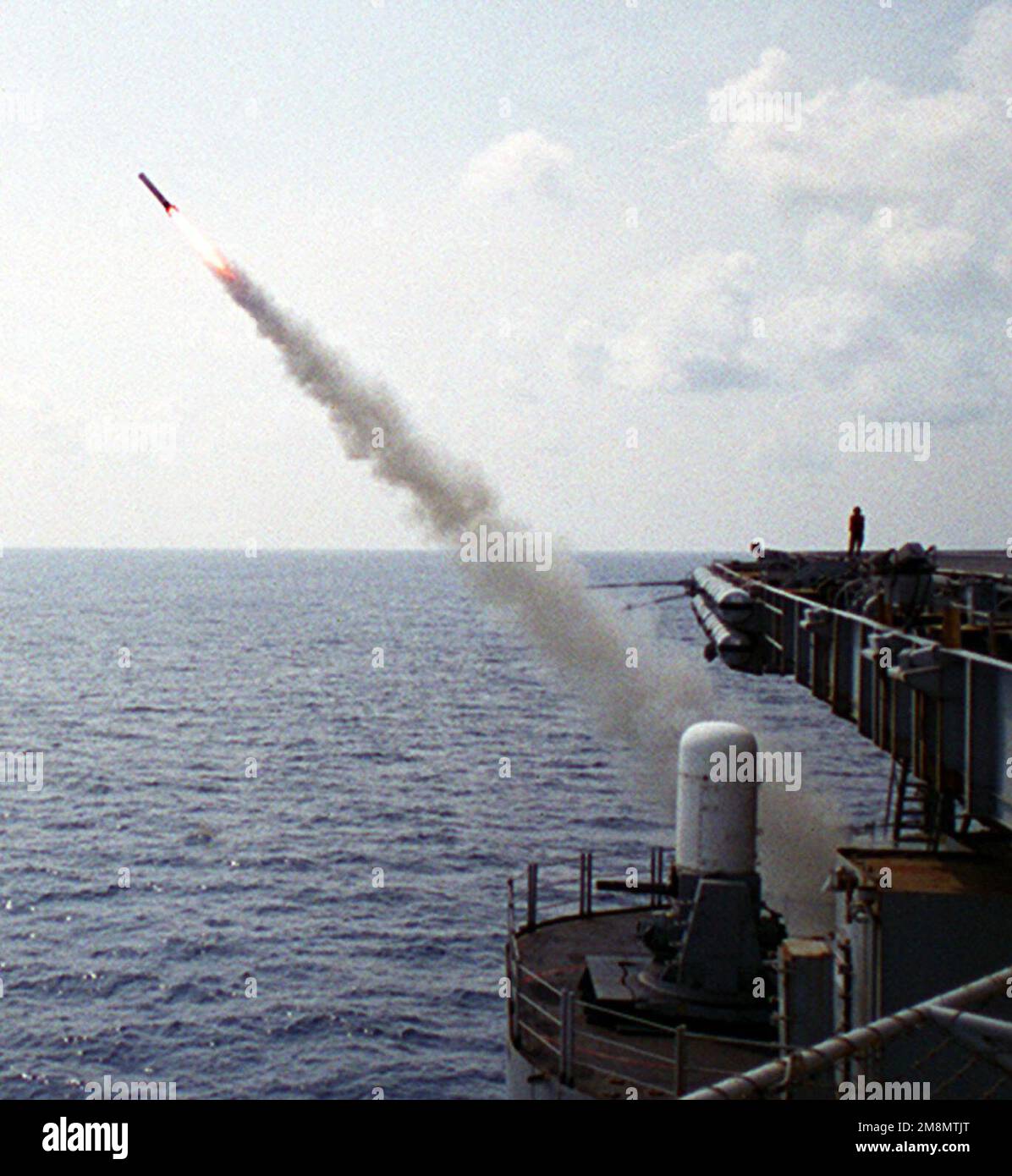 The aircraft carrier USS NIMITZ (CVN 68) fires one of its ...