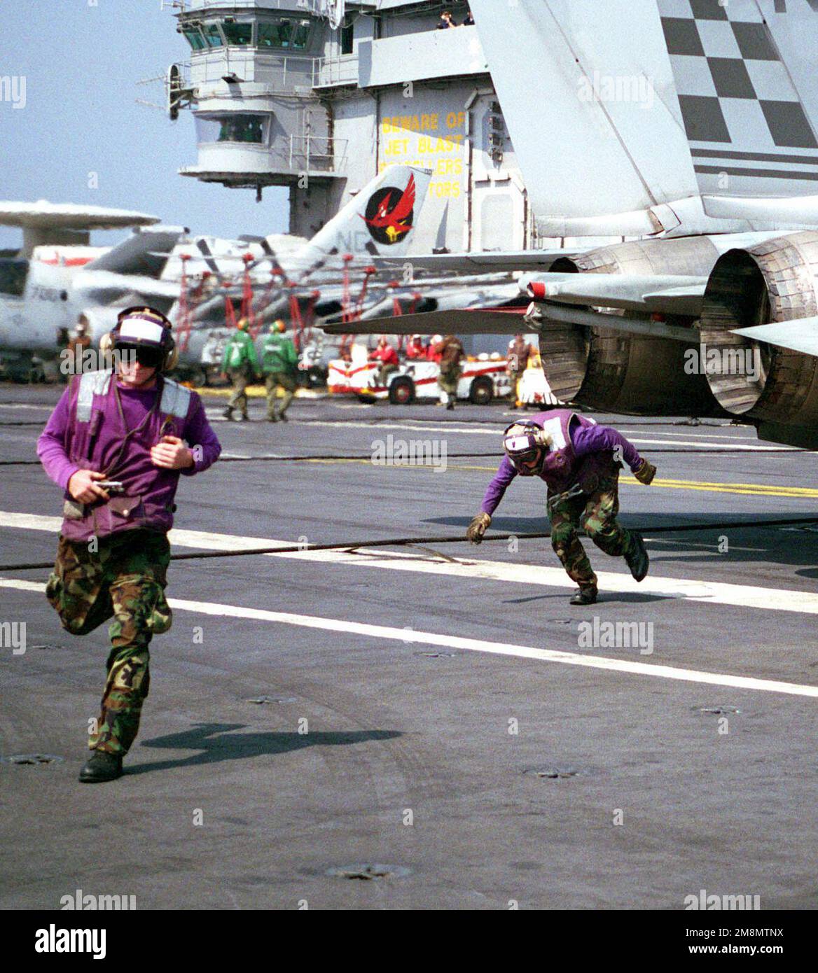 US Navy Aviation Boatswain's Mate AIRMAN (ABAN) Geoff Wiseman (left ...
