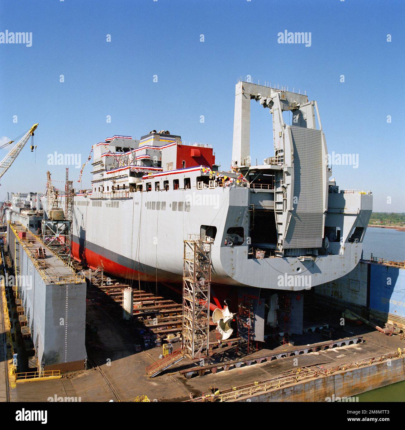 Starboard quarter view of the Military Sealift Command (MSSC) strategic heavy lift ship USNS ...