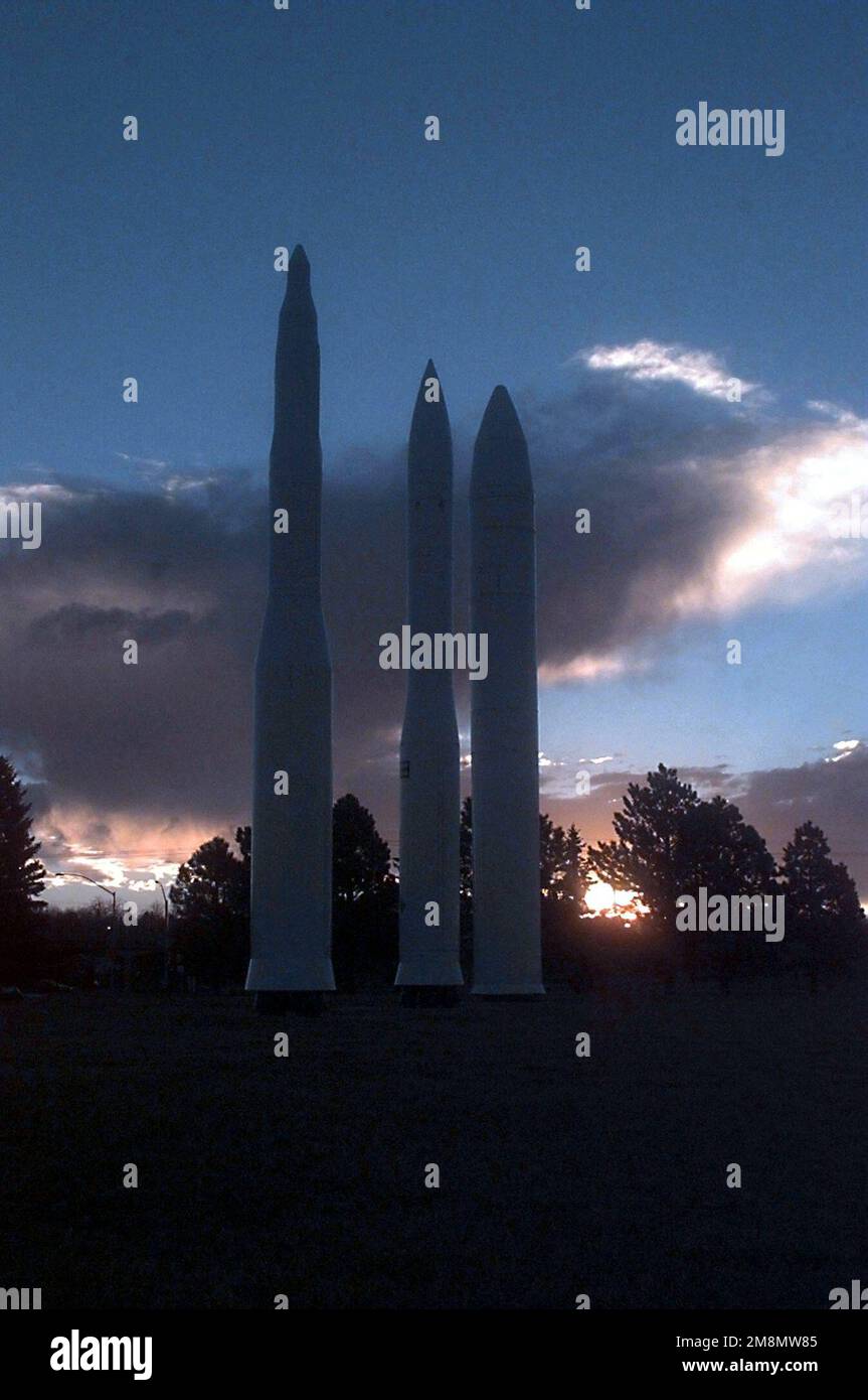 Peacekeeper and Minuteman III missile displays are silhouetted against ...