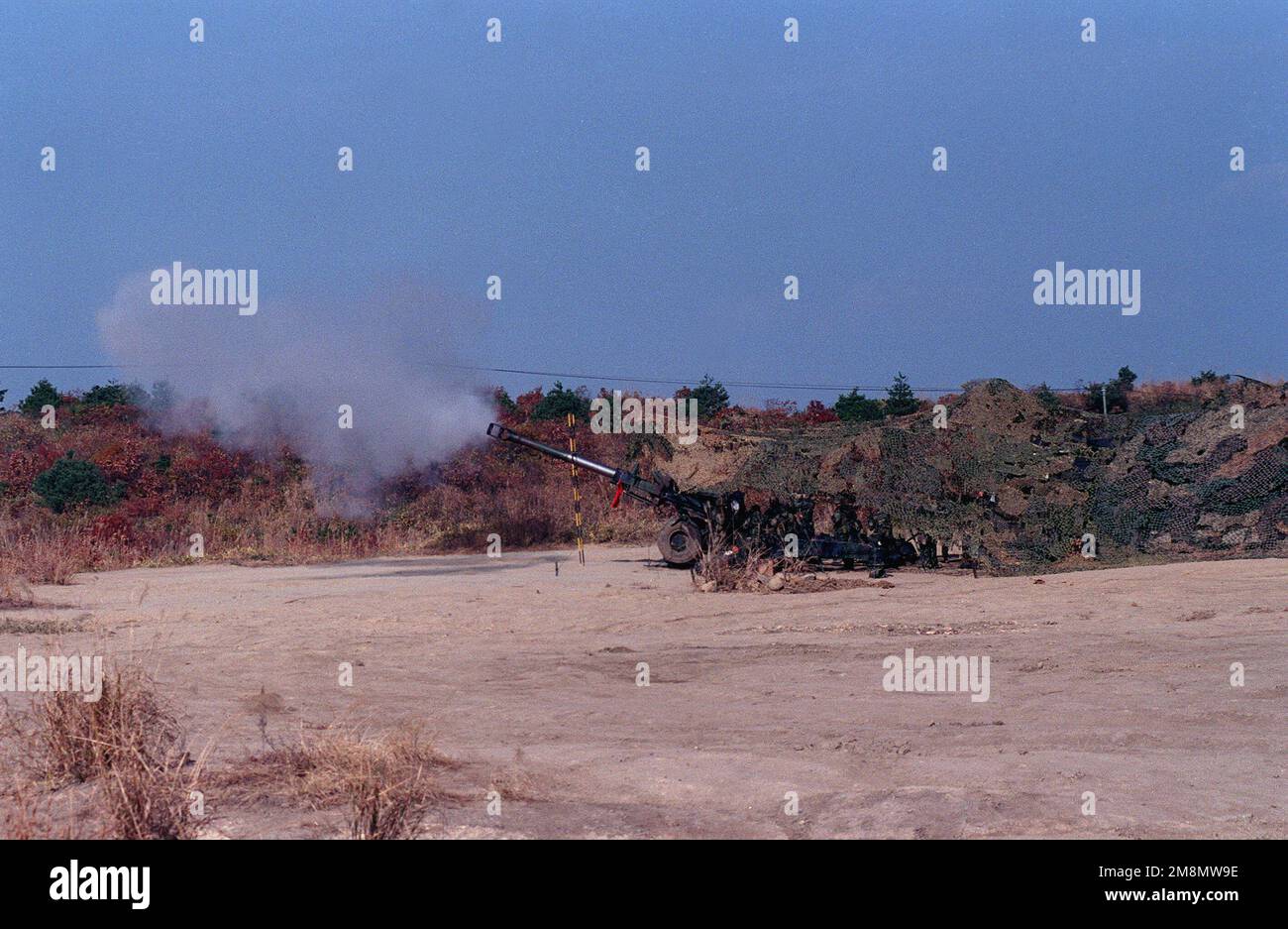 Gun #2, "C" Battery, 1ST Battalion, 12th Marine Regiment, fires a round ...