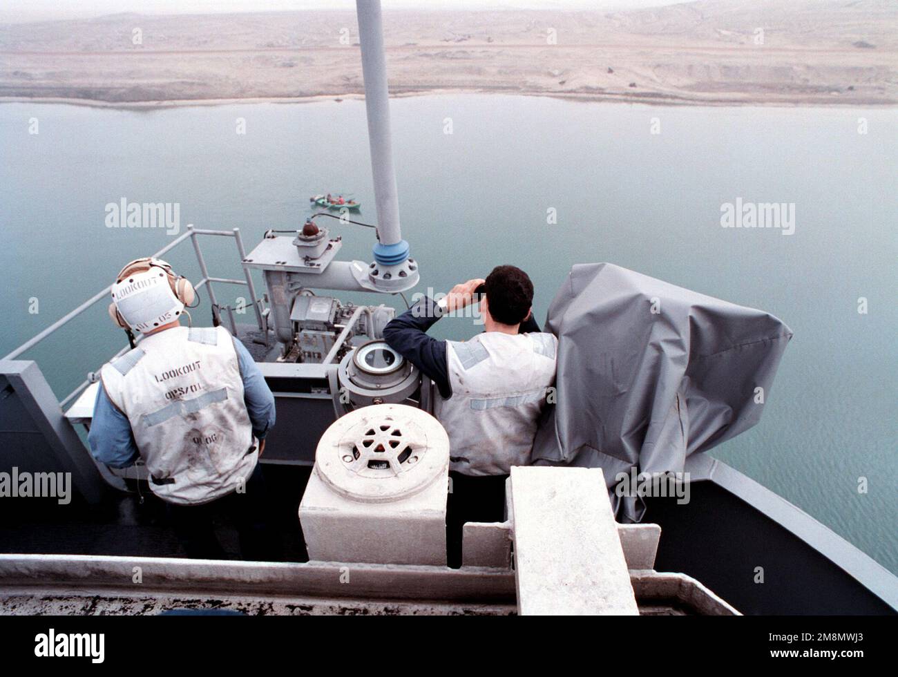 Operation SPECIALIST SEAMAN Sergiosavl Moreno (right) observes a ...