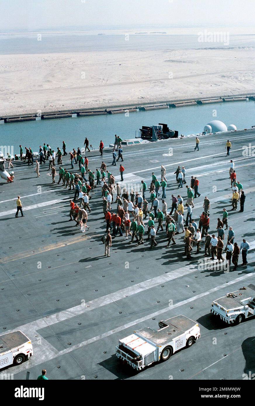 US Navy sailors from the nuclear powered aircraft carrier USS GEORGE ...