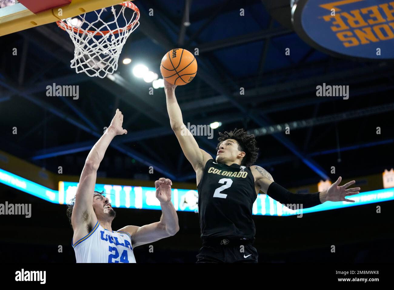 Colorado guard KJ Simpson (2) shoots against UCLA guard Jaime Jaquez Jr. (24) during the first ...