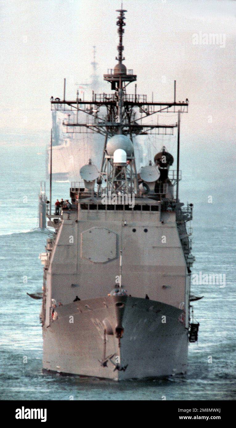 The ticonderoga class cruiser USS NORMANDY (CG 60) (Front), followed by ...