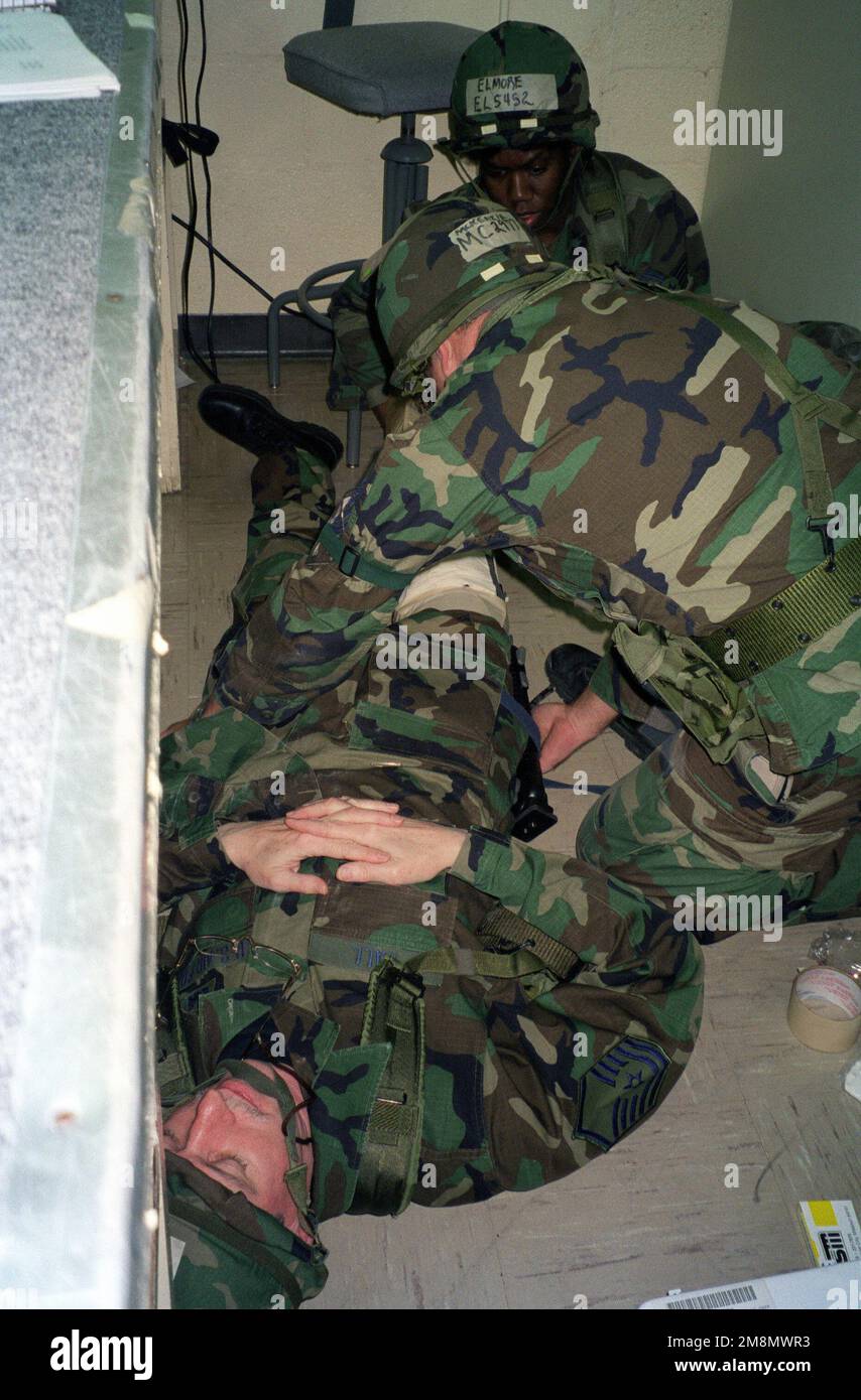 Using Buddy Care techniques, US Air Force STAFF Sergeant (SSGT) Elmore ...