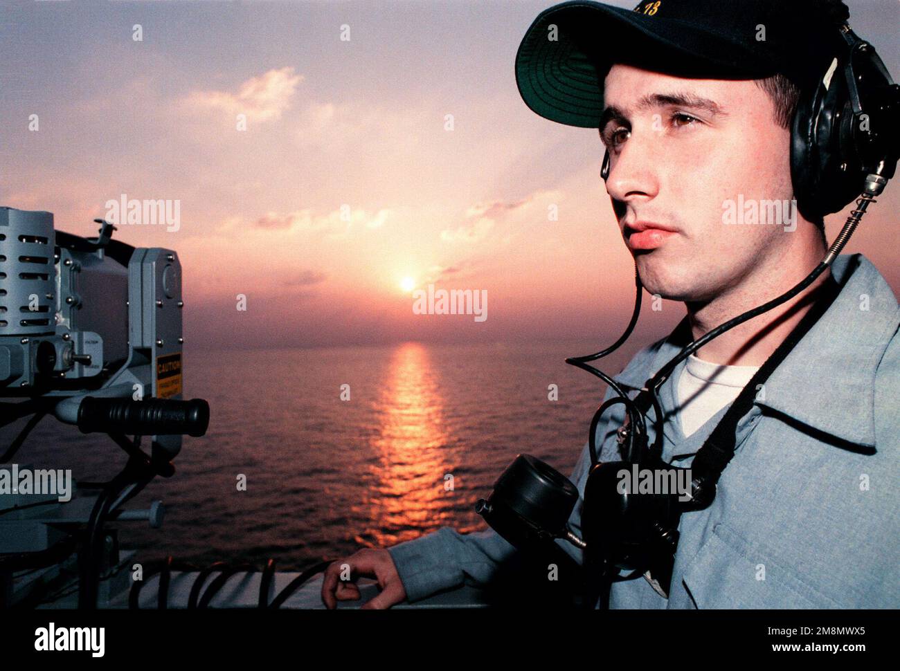 Armed with a set of binoculars and sound powered phone communications ...