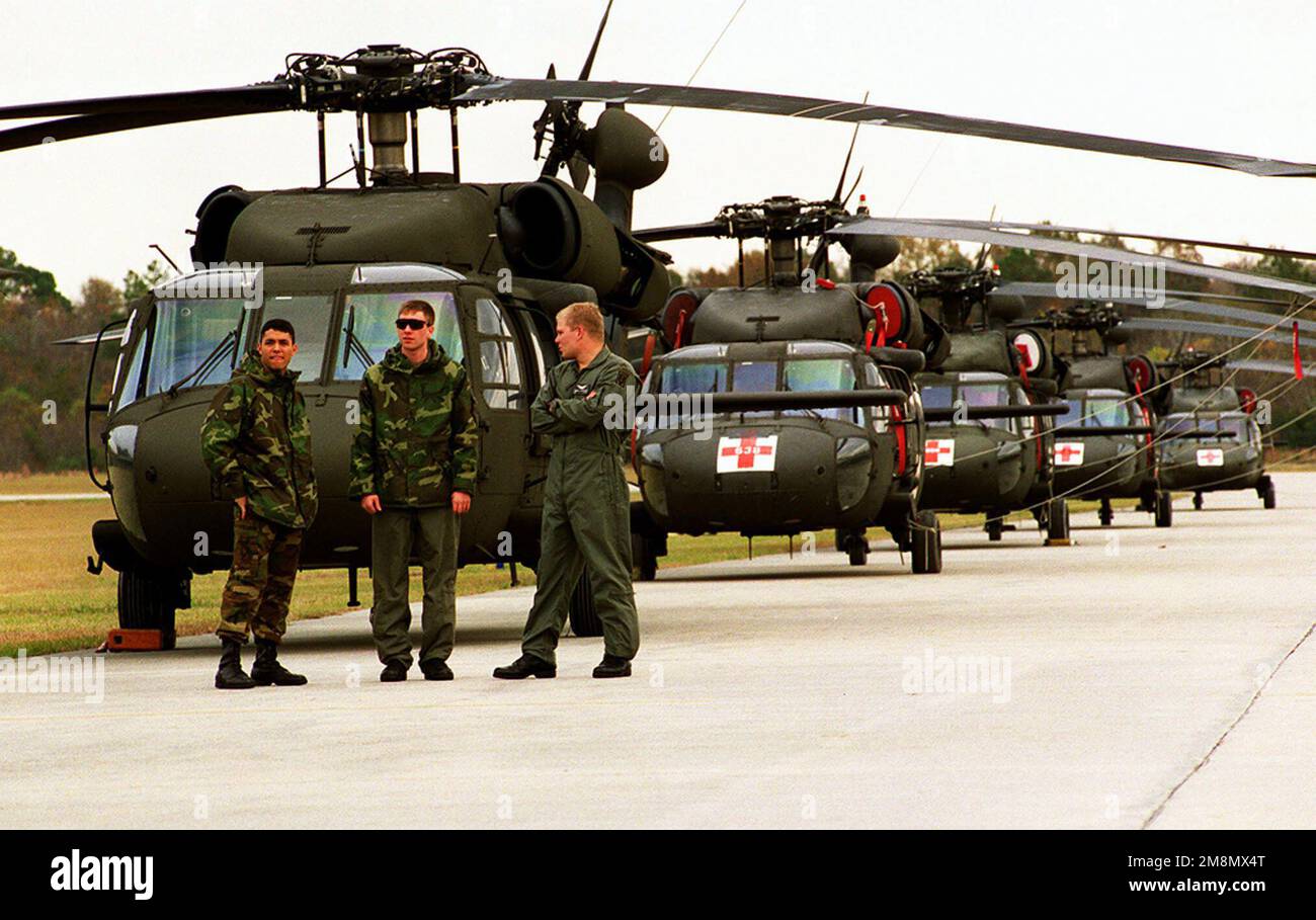 CW2 Chad Fredrick, CW2 Sean Woodman, and CW2 Tracy Stapleton, L/company ...