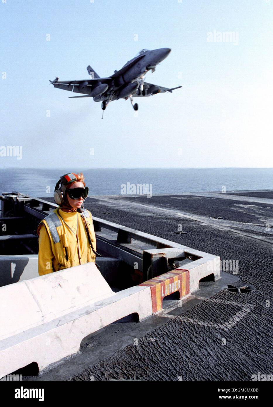 LTJG Brye Roberts stands the gear officer watch on the flight deck of ...
