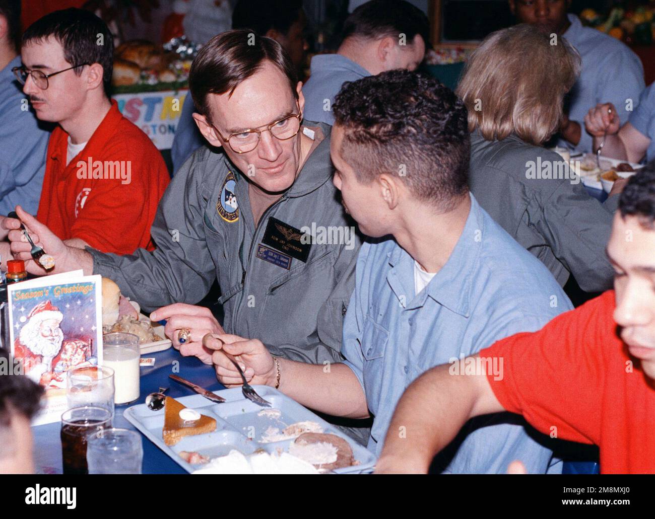 CHIEF of Naval Operations, ADM Jay L. Johnson, talks with AMN Alan ...