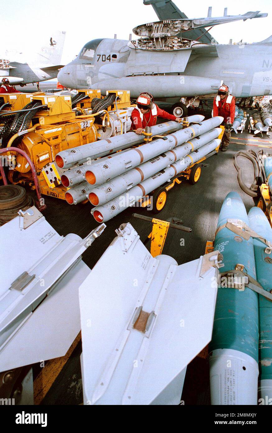 US Navy Aviation Ordnanceman 3rd Class (AO3) Alvin Toney and Aviation ...