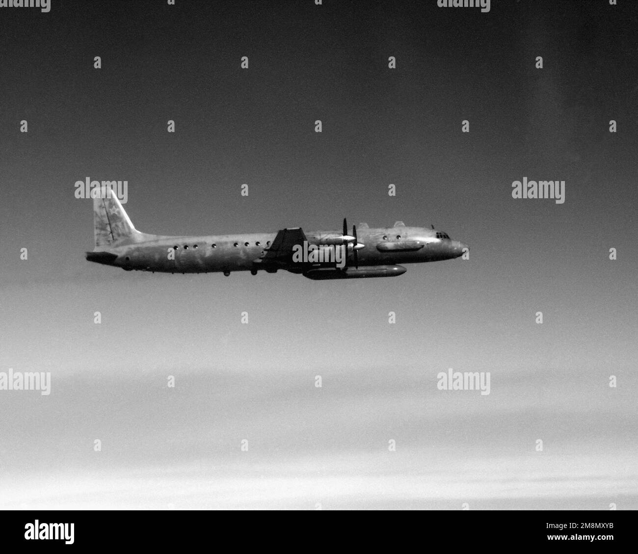 An air-sto-air right side view of the Soviet I1-20 Coot A aircraft ...