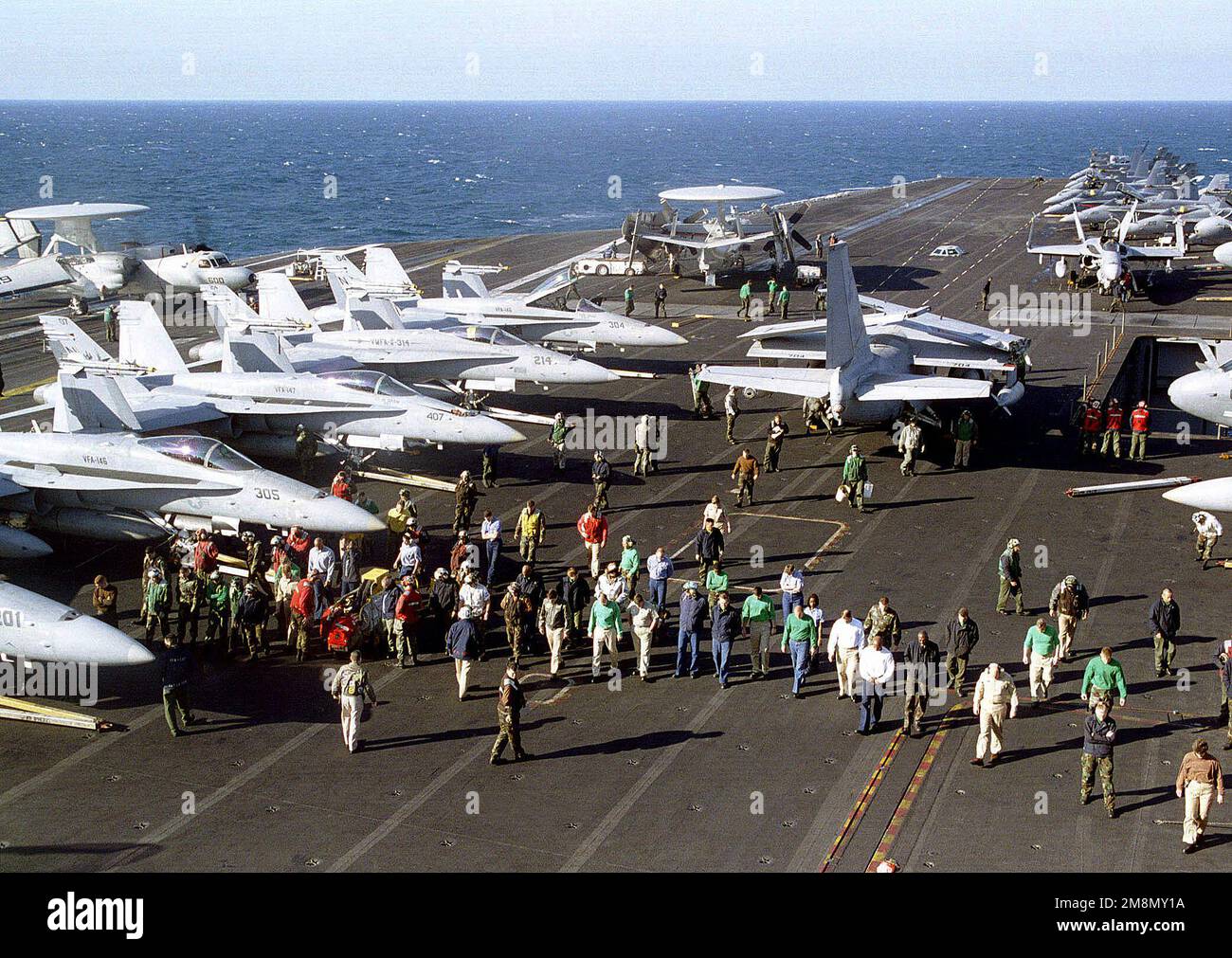 Prior to flight operations, US Navy crewmen of the nuclear powered ...