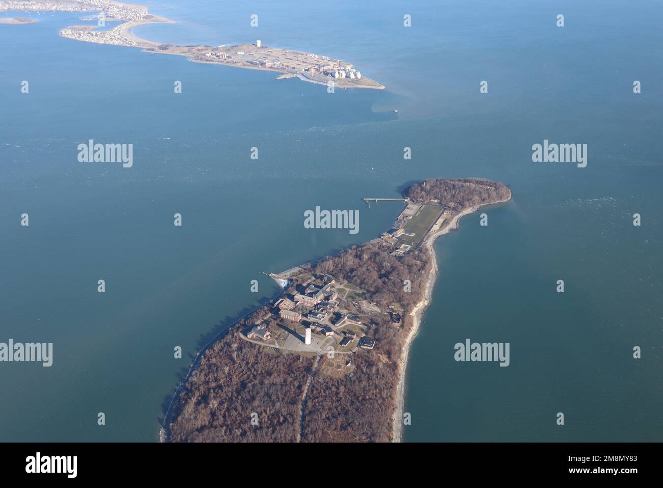 View from airplane window - airplane wing over harbor Stock Photo - Alamy