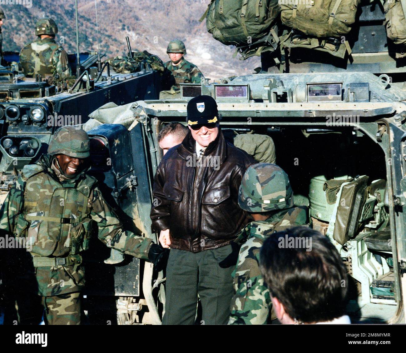 The Honorable William Cohen, Secretary of Defense, jokes with soldiers ...