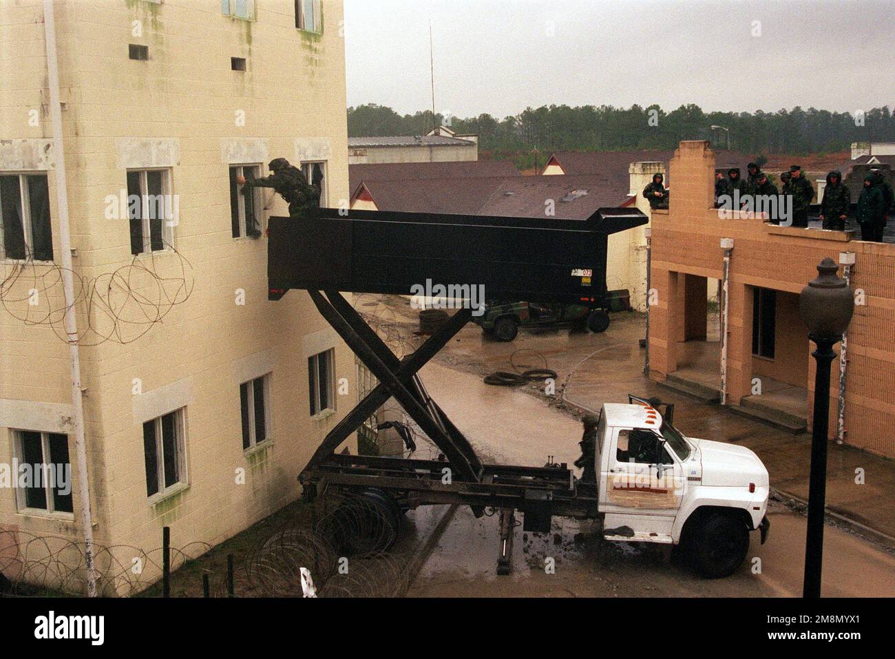 Marines from Charlie Company, 1ST Battalion, 6th Marines, aquire a lift ...