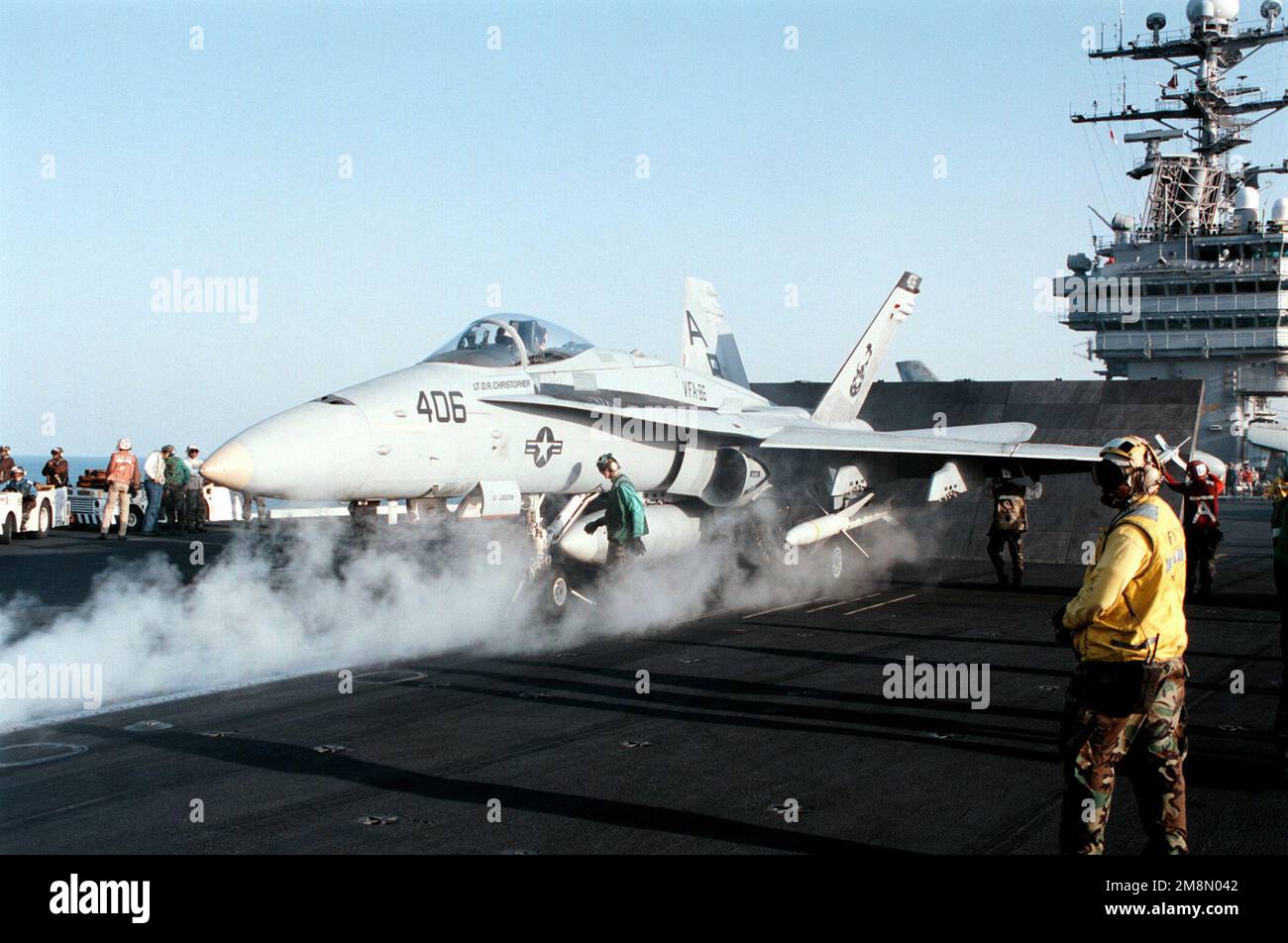 An F/A-18C Hornet from Fighter Attack Squadron 86 (VFA-86) readies for ...